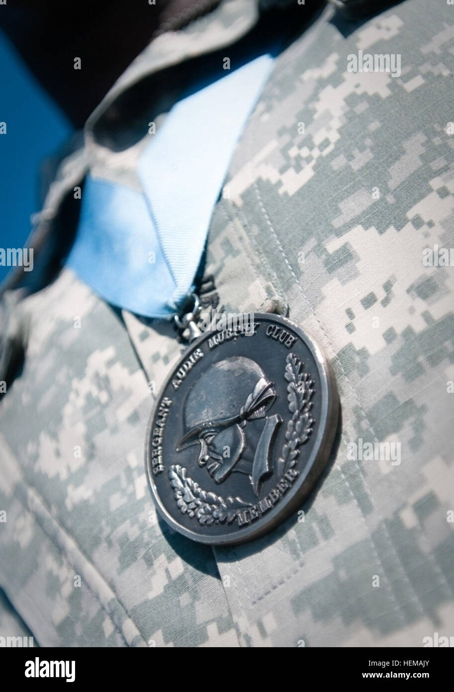 The Sergeant Audie Murphy Club medallion hangs from the neck of Sgt ...