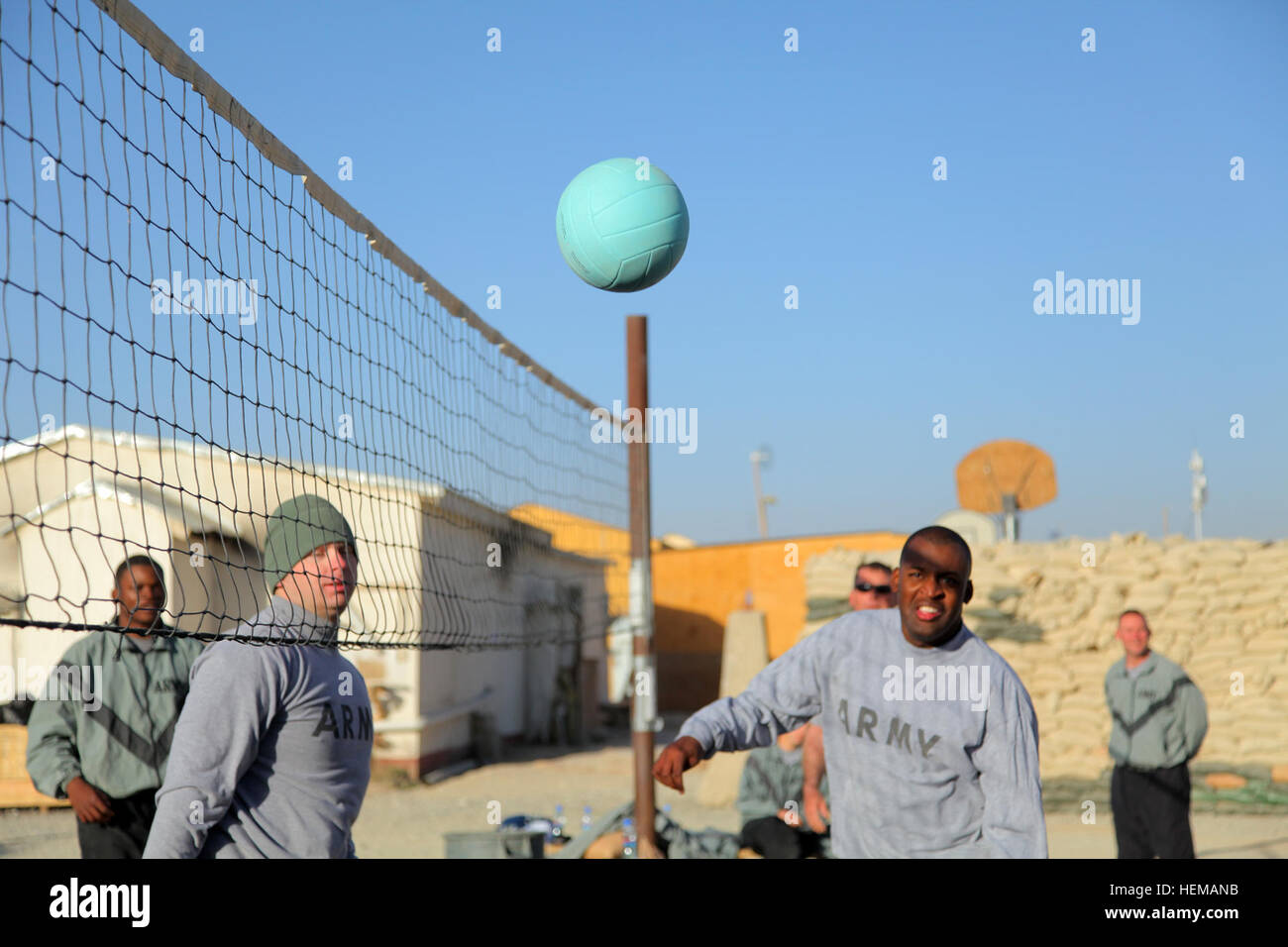 U.S. Army Soldier races to make a play on the volleyball on Forward ...