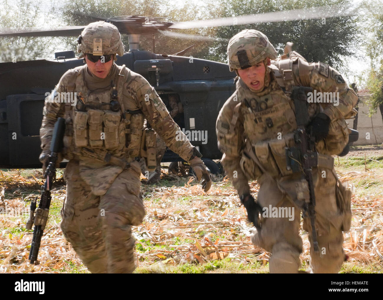 U.S. Army Sgt. Jeremiah Durstine, a team leader (left), and U.S. Army ...