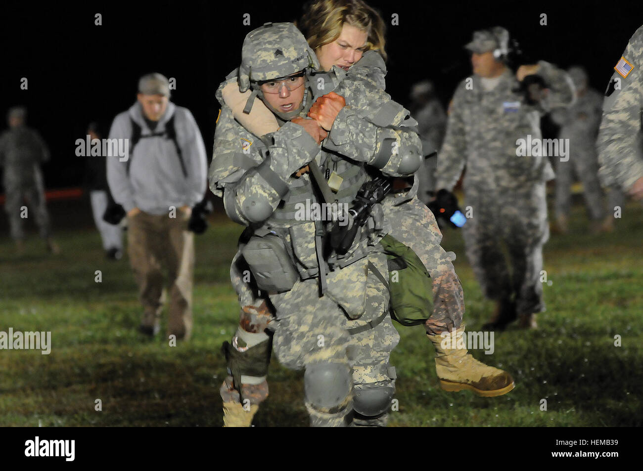 Sgt. Matthew Howard, Army National Guard, carries a casualty role ...