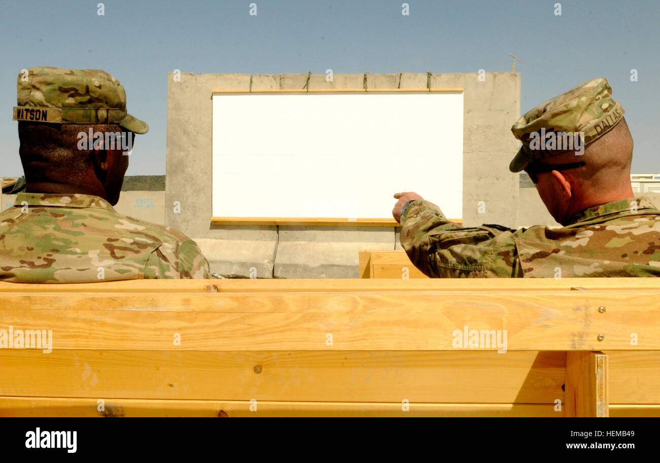 From left, Command Sgt. Maj. Edd Watson, command senior enlisted leader ...