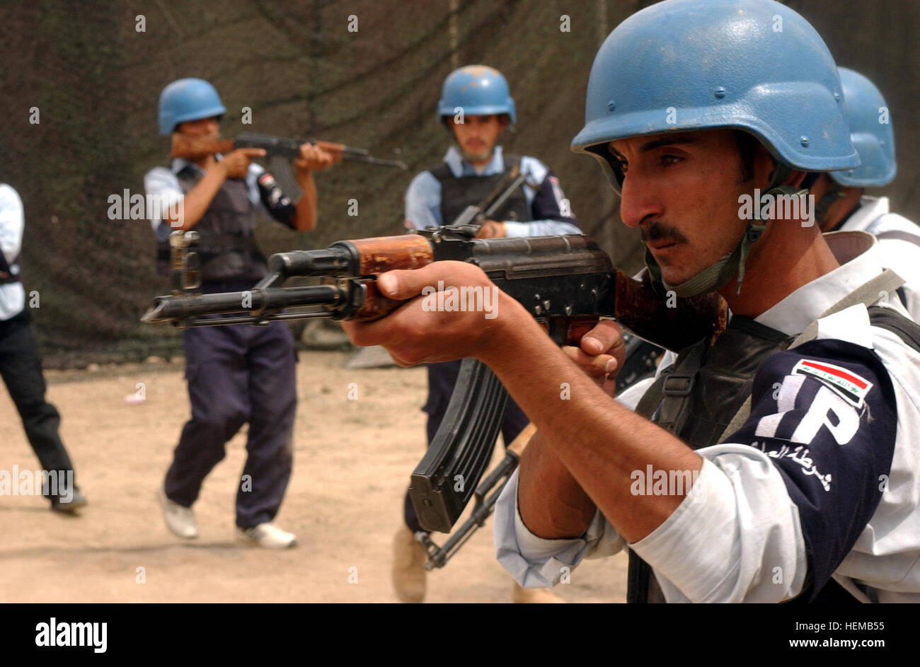 Iraqi police officers practice patrolling at Camp Hero in Ramadi, Iraq ...