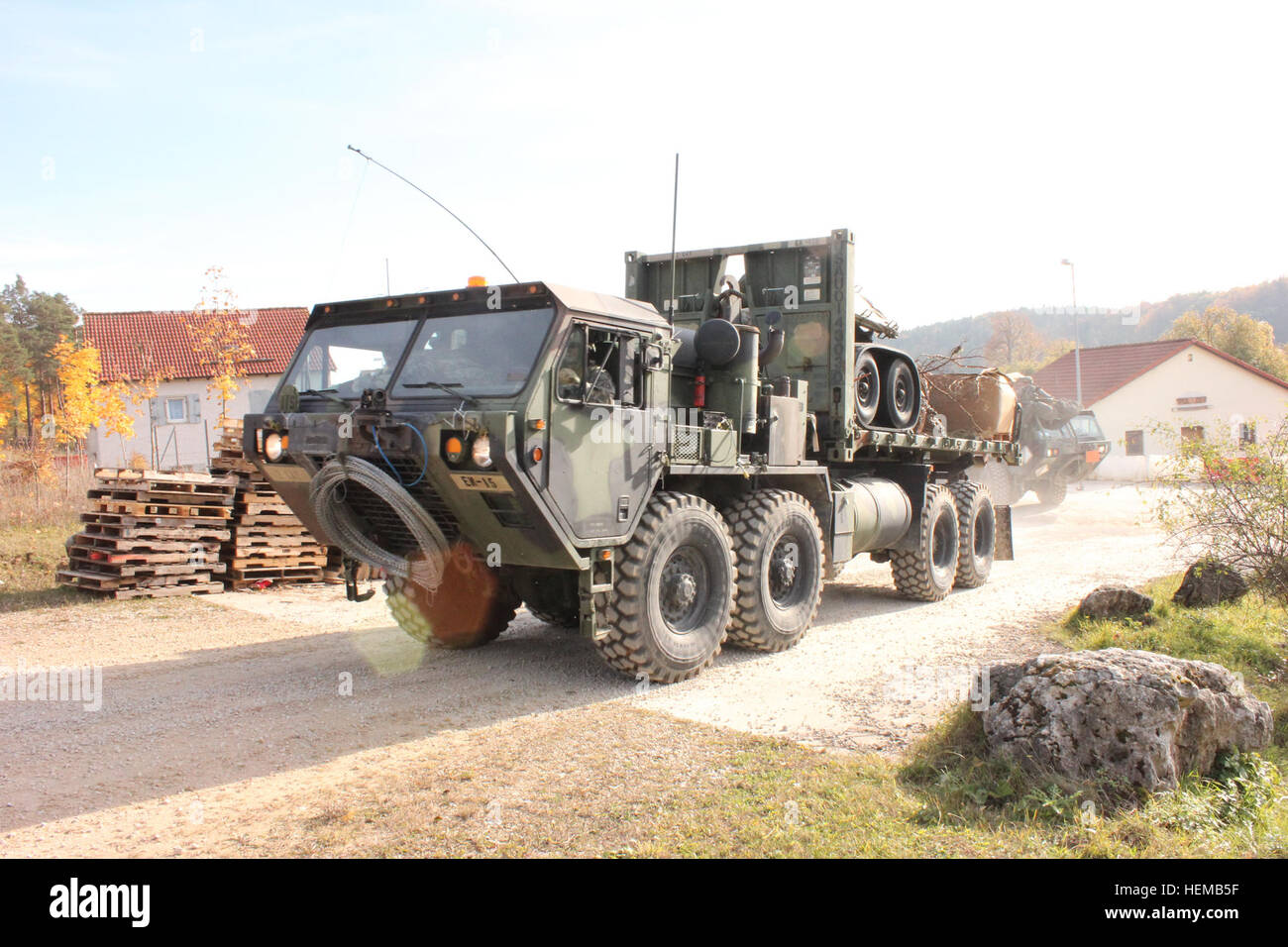 U.S. Army Soldiers of 1st Squadron, 2nd Cavalry Regiment drive two M984 ...