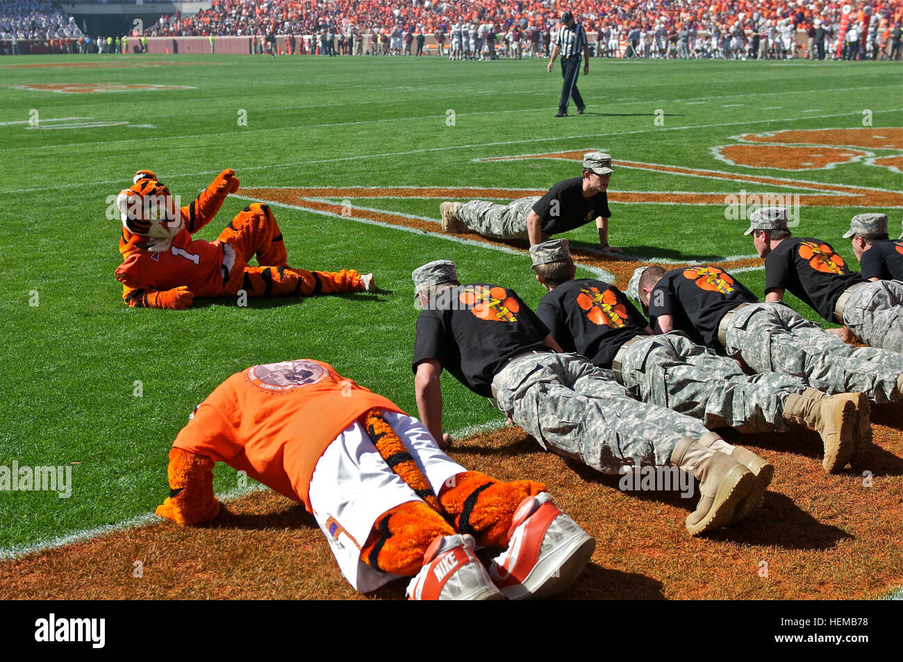 The Clemson University Ranger Club does push-ups after a touchdown at ...