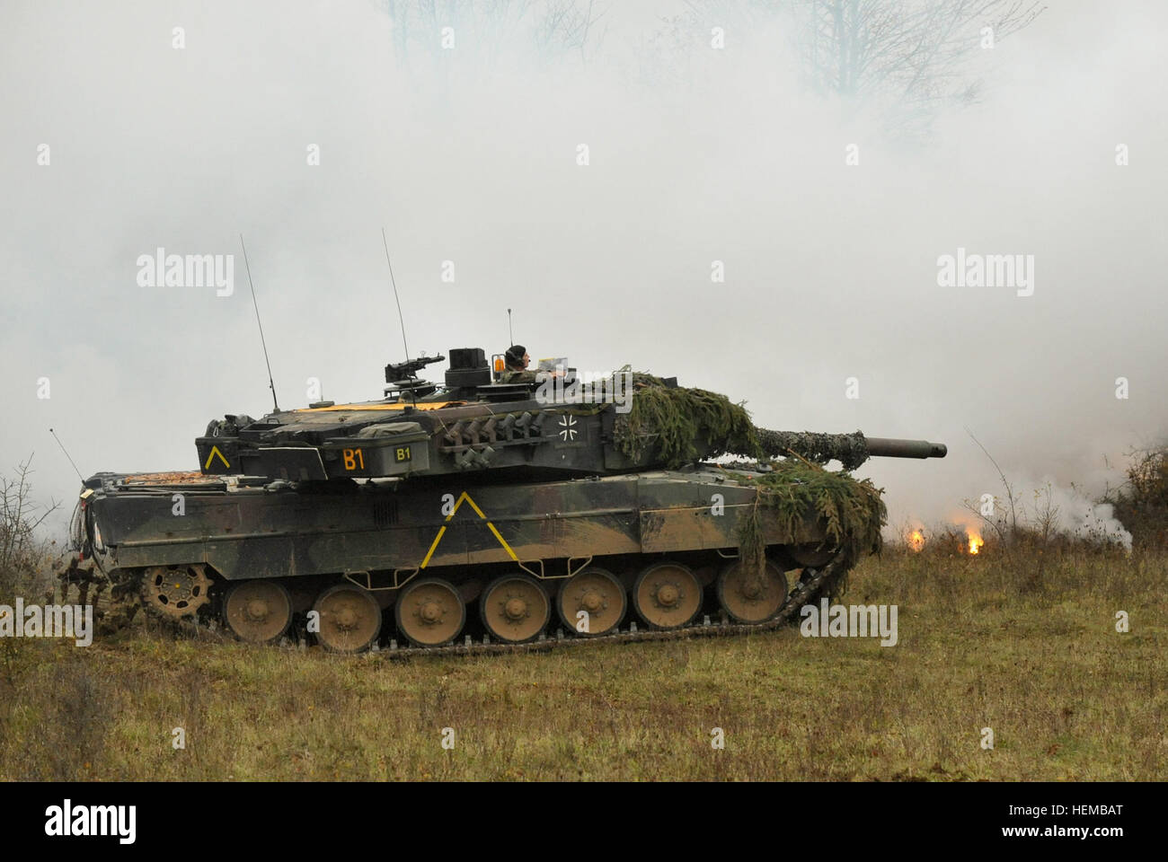 A German Army Leopard II tank, assigned to 104th Panzer Battalion, lays ...