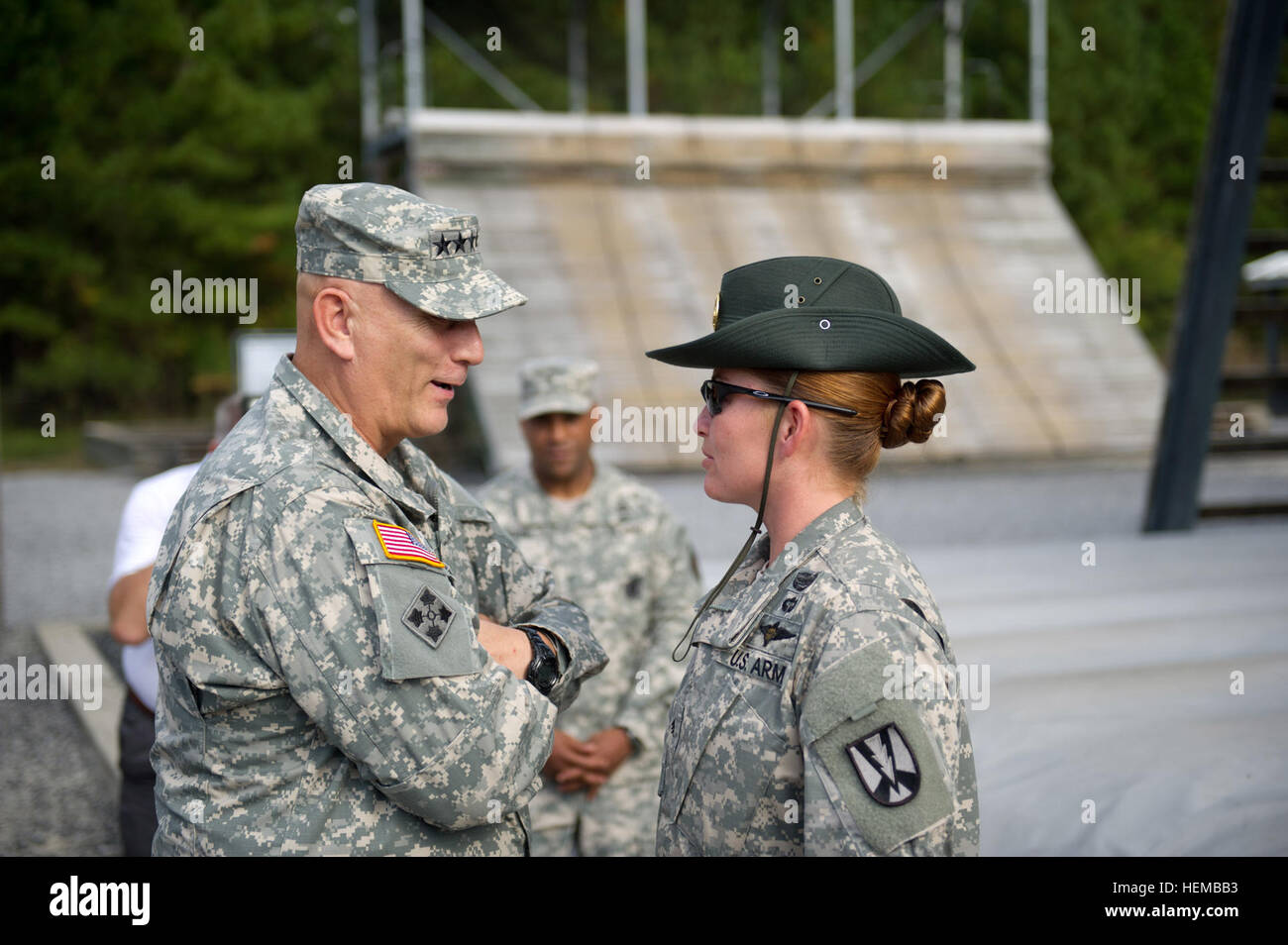 U.S. Army Chief of Staff Gen. Ray Odierno speaks to Sgt. Serina Glass ...