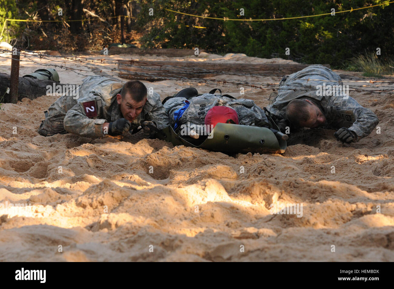 CAMP BULLIS, Tx. -- Spc. Daniel Holmes and Spc. Jason Snelling maneuver ...