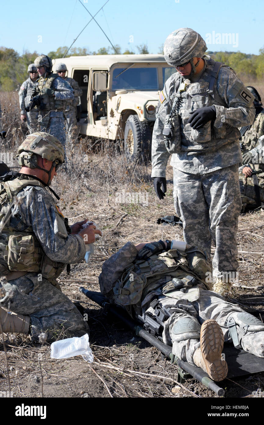 Staff Sgt. Henry Delevett, right, an observer controller/trainer with ...