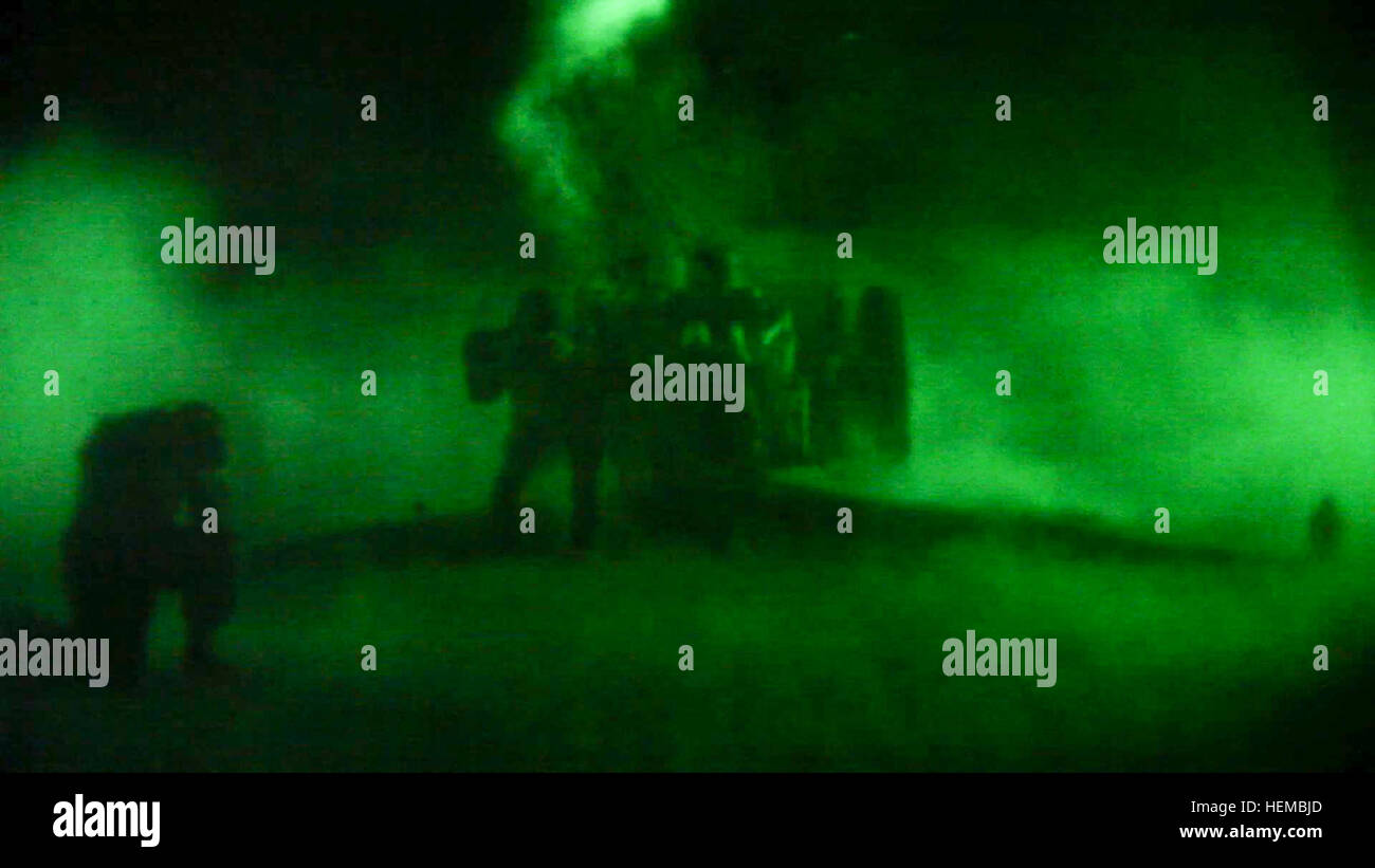 Afghan National Army soldiers fire a D30 Howitzer during a night fire ...