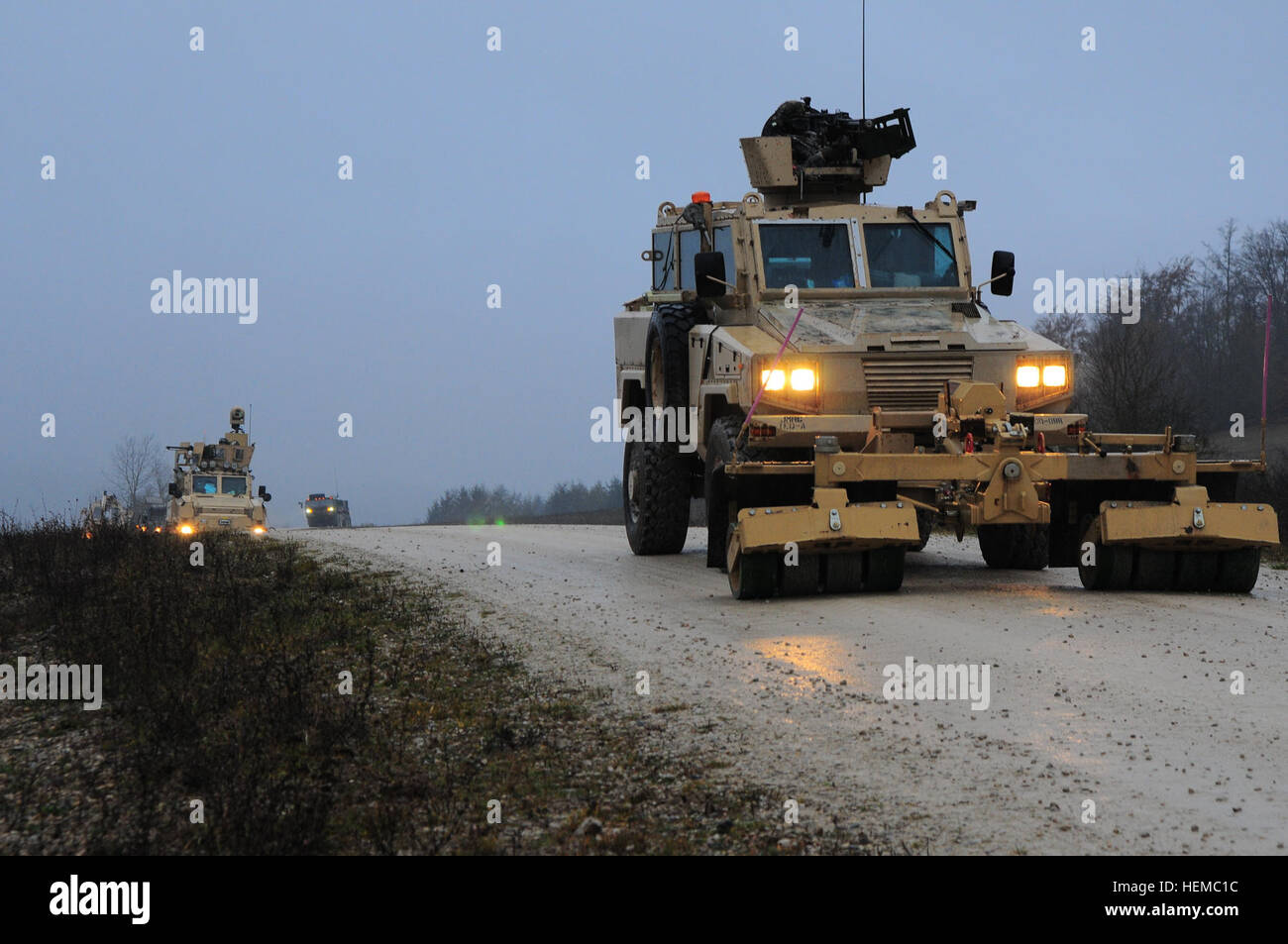 U.S. Army Soldiers from the 370th Engineer Company conduct a route ...