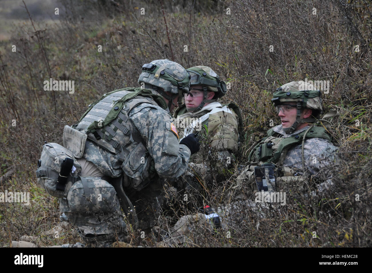 A U.S. Army Soldier with the 370th Engineer Company renders medical aid ...
