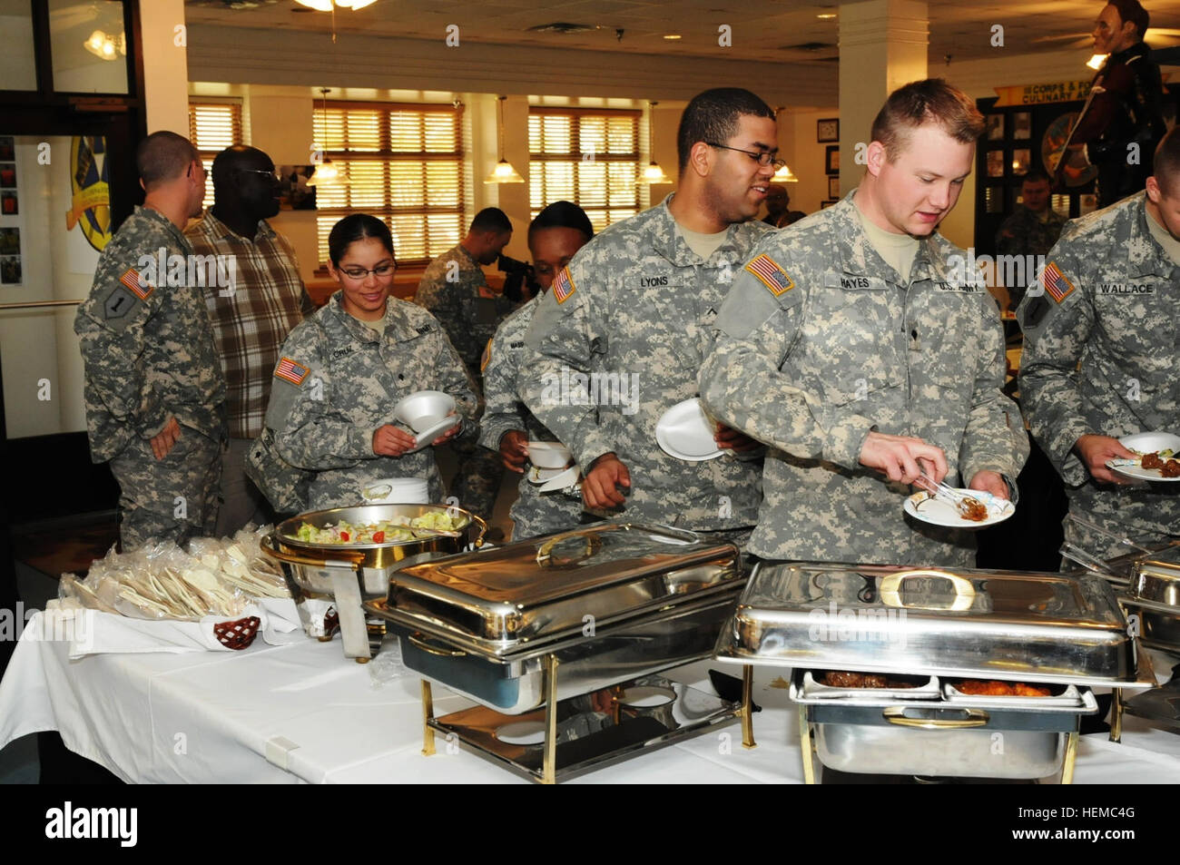 Soldiers and civilians line up to sample fresh cuisine during the III ...
