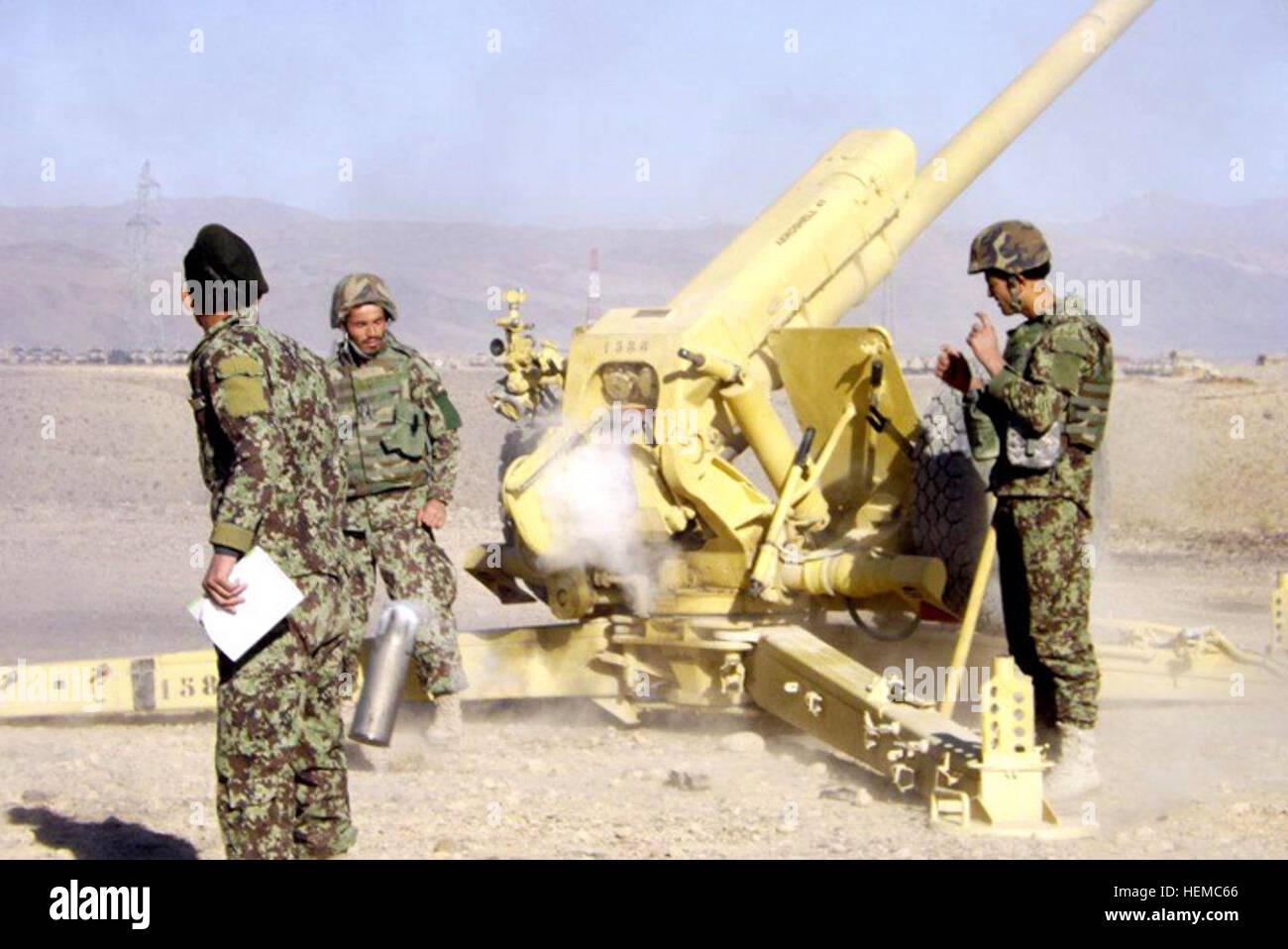 Afghan National Army soldiers fire artillery during an independently ...