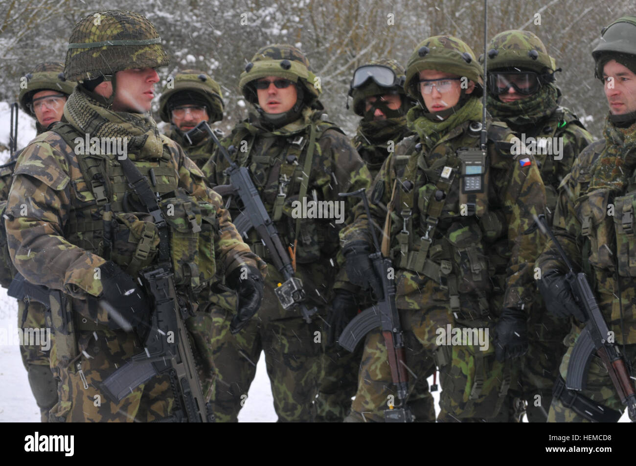 A Czech soldier (left) translates orders during a military advisory ...