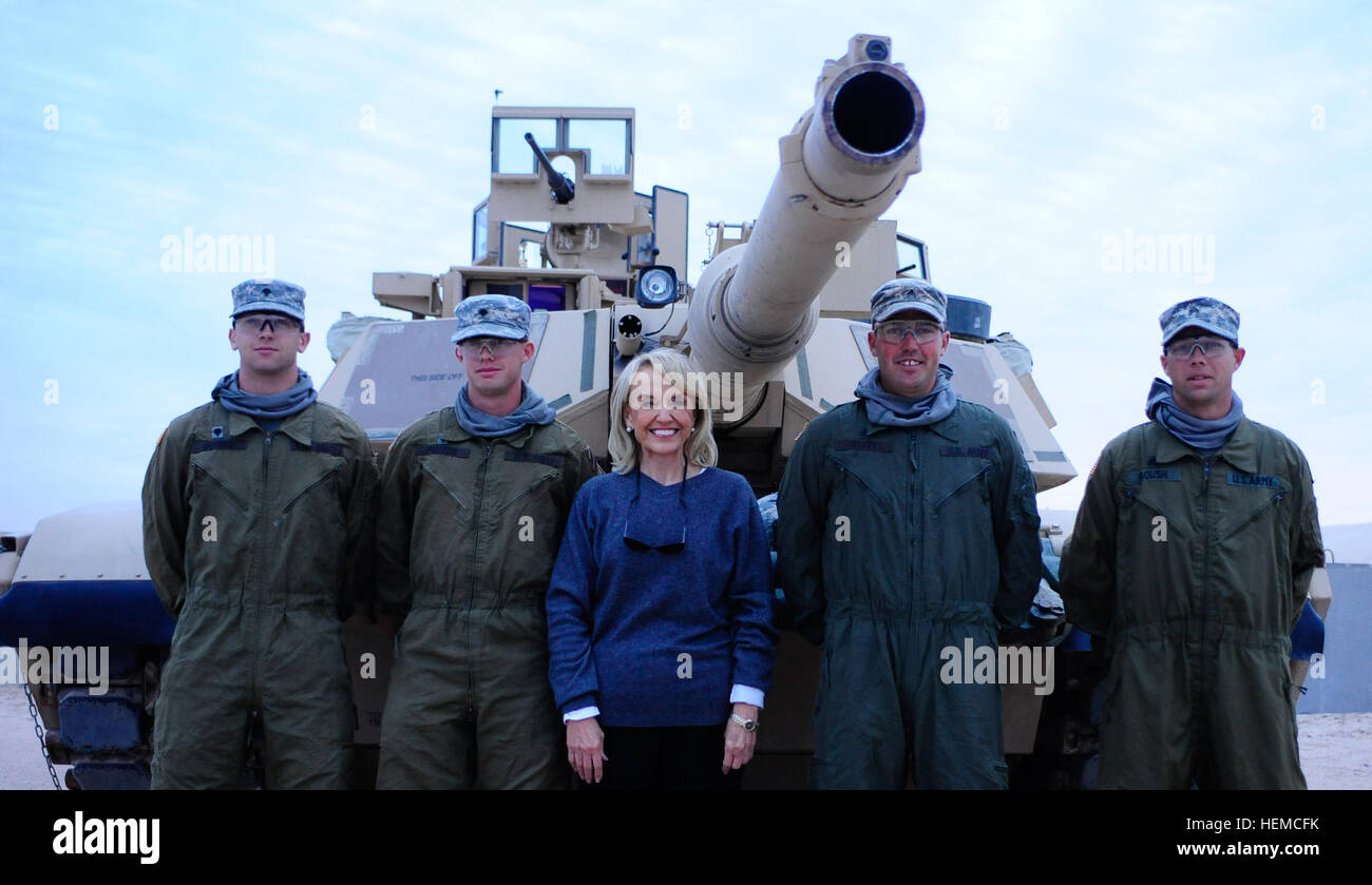 Arizona Gov. Jan Brewer poses with an M1A2 Abrams Main Battle Tank crew ...