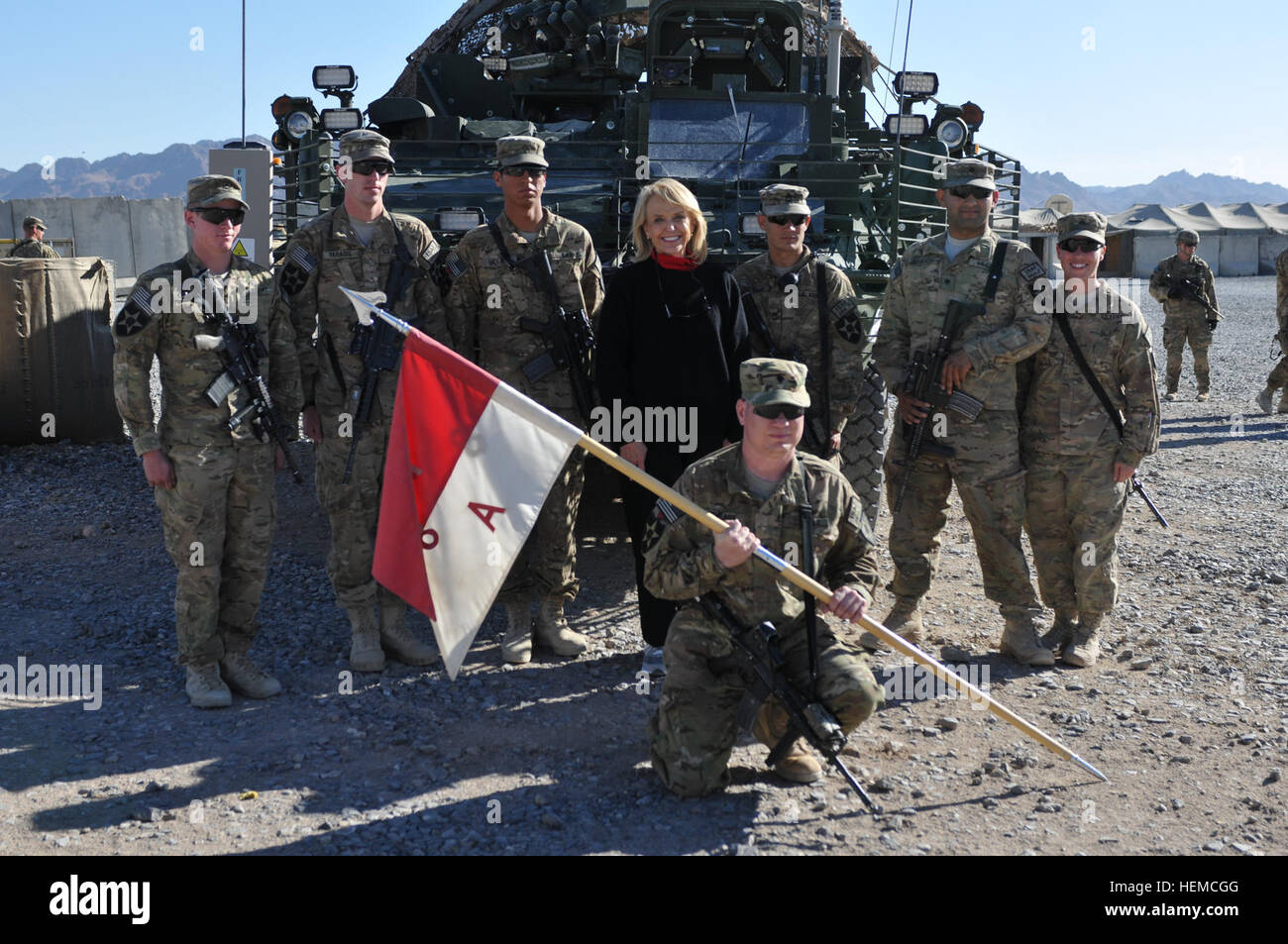 Ariz. Gov. Janice K. Brewer poses Dec. 5 for a photo with soldiers from ...