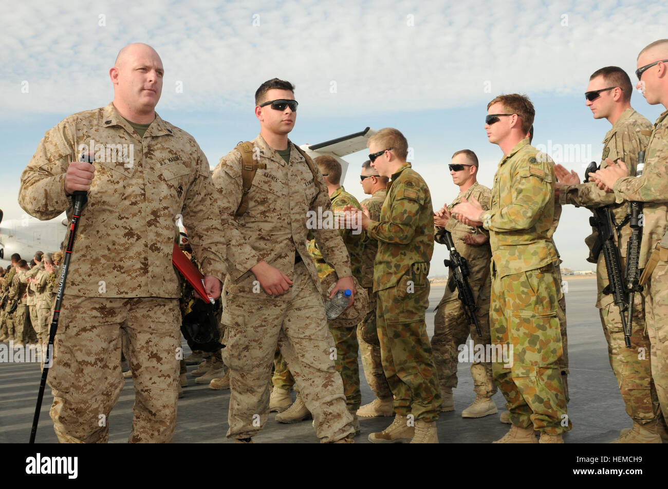 Marine Corps Staff Sgt. Glen Silva and Lance Cpl. Jonathan Carnes are ...