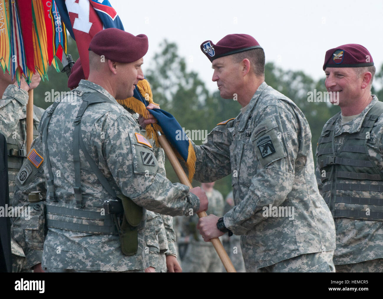 XVIII Airborne Corps Commanding General Daniel Allyn, center, passes ...