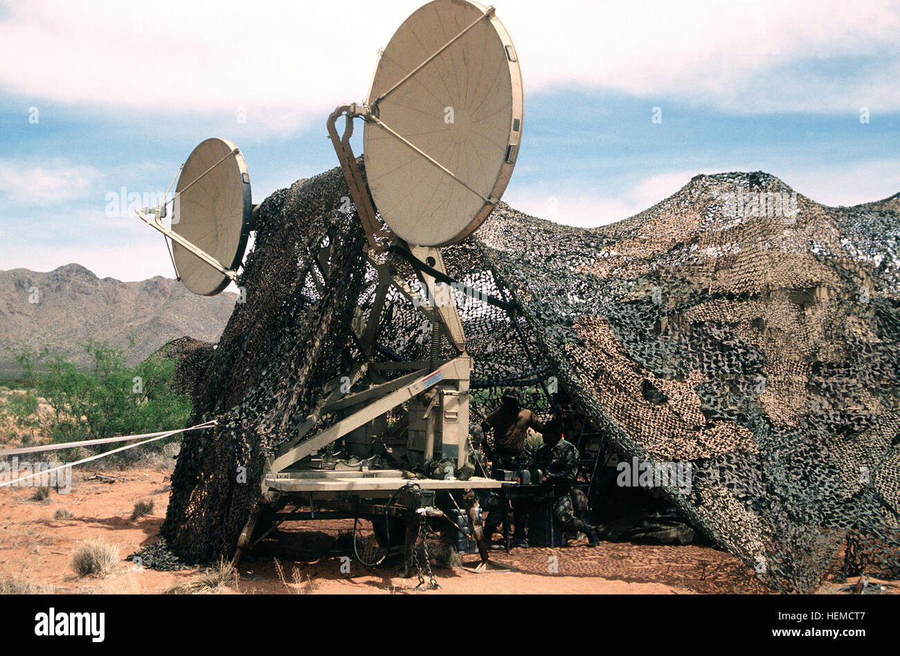 A close-up view of dual 9 1/2' tropo scatter microwave dishes. They are ...