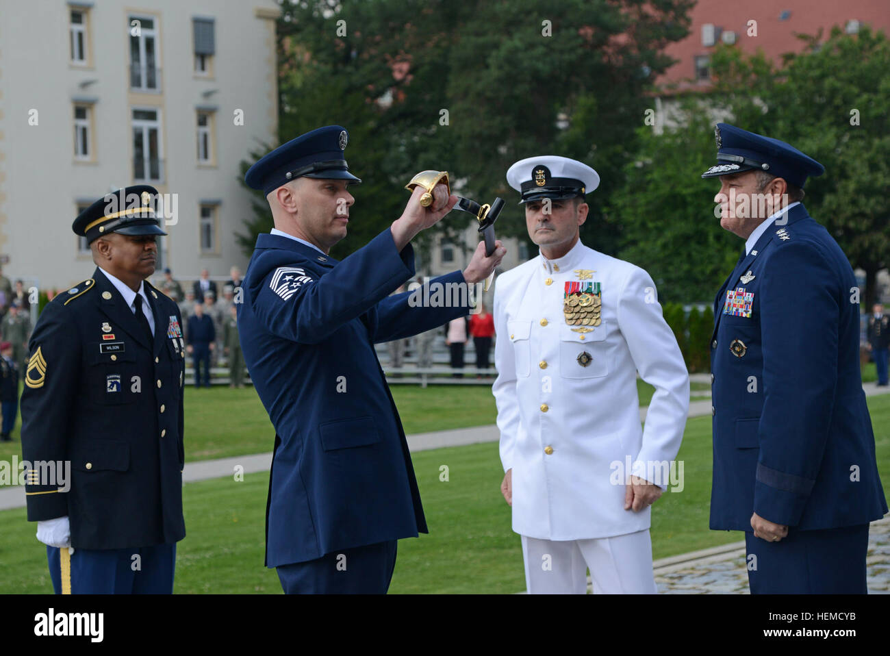 U.S. Air Force Chief Master Sgt. Craig Adams, center, the incoming ...