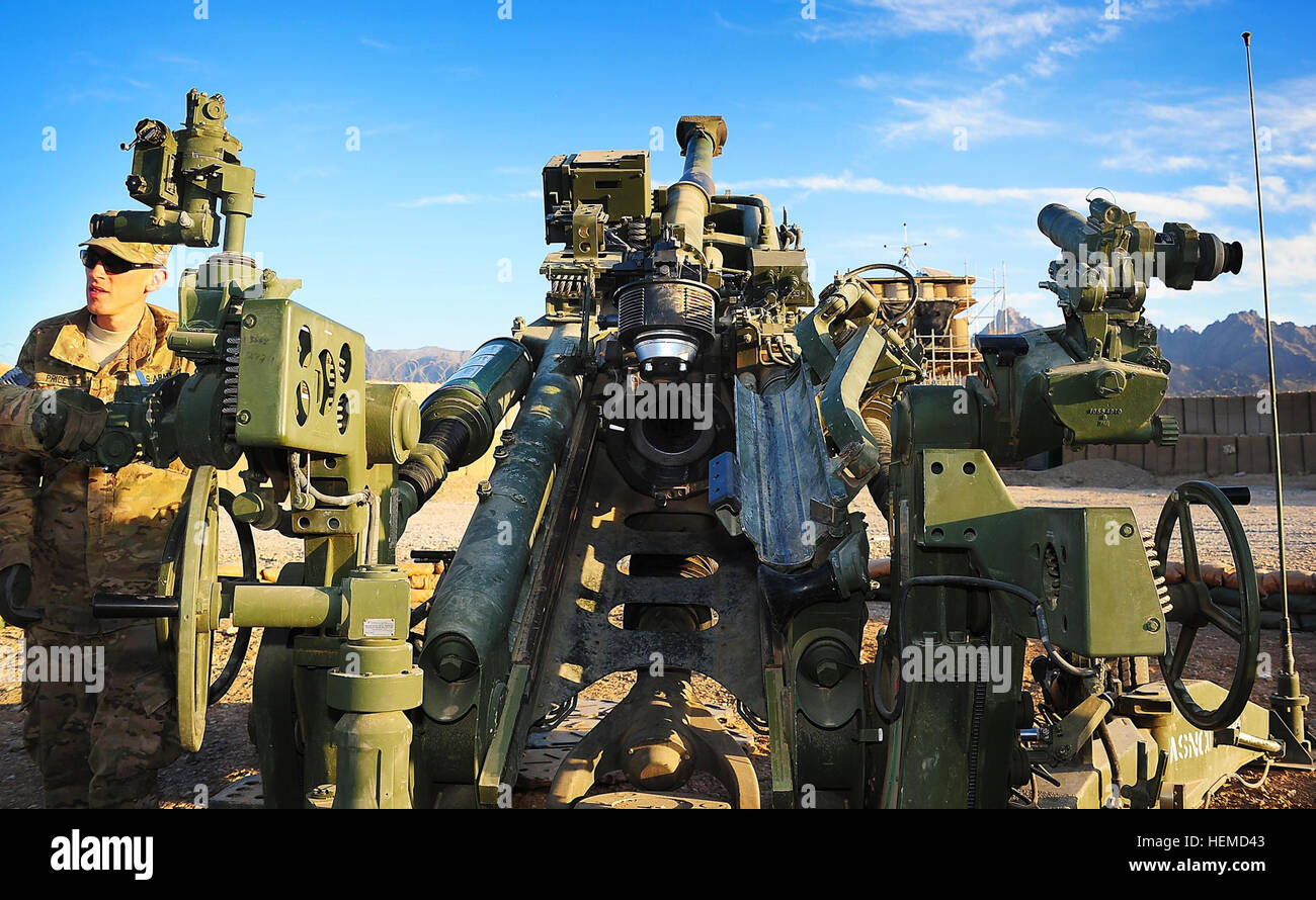 A United States gun crew runs through drills on the M777 Howitzer at ...