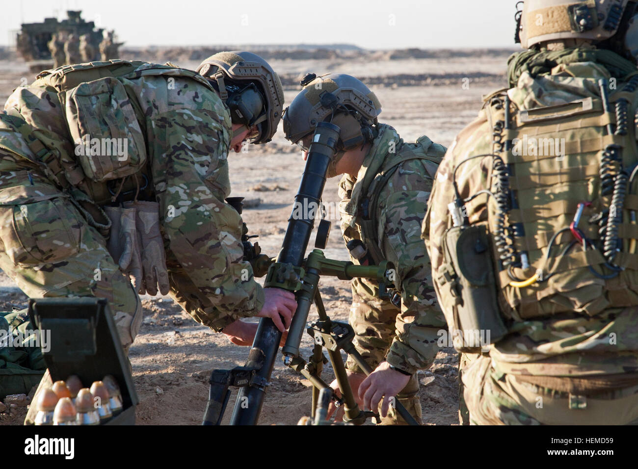 Coalition soldiers participate in mortar training at a firing range in ...
