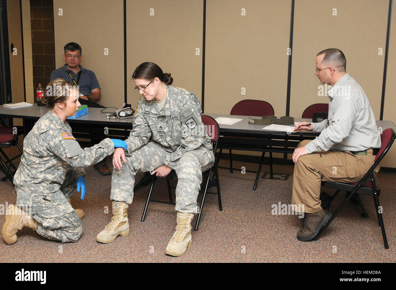 South Dakota Army National Guard soldier Pfc. Elizabeth Bales, left ...