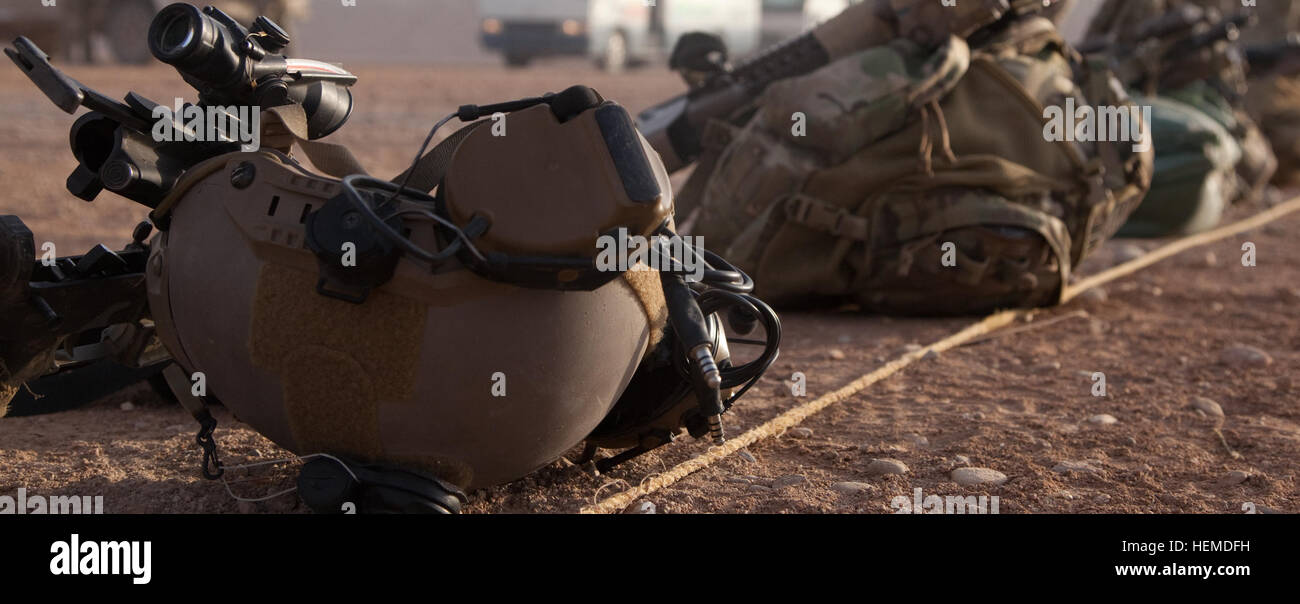 Gear of coalition soldiers lays at the firing line while before ...