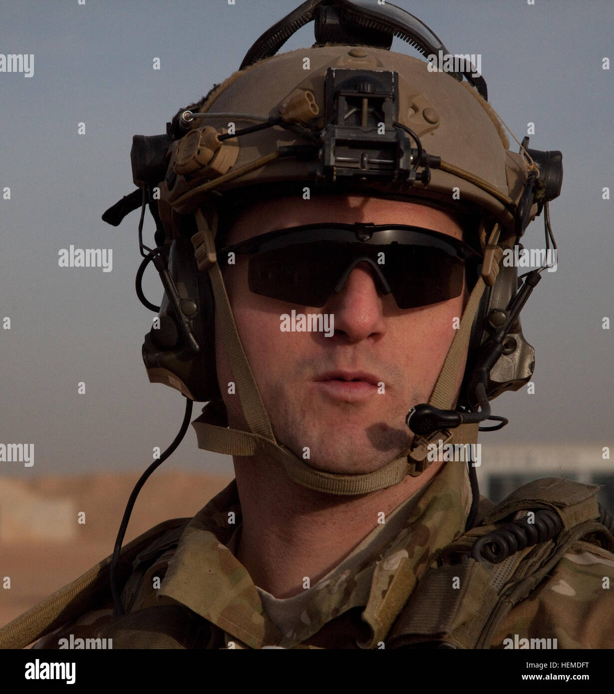 A coalition soldier prepares to engage the target at a firing range on ...