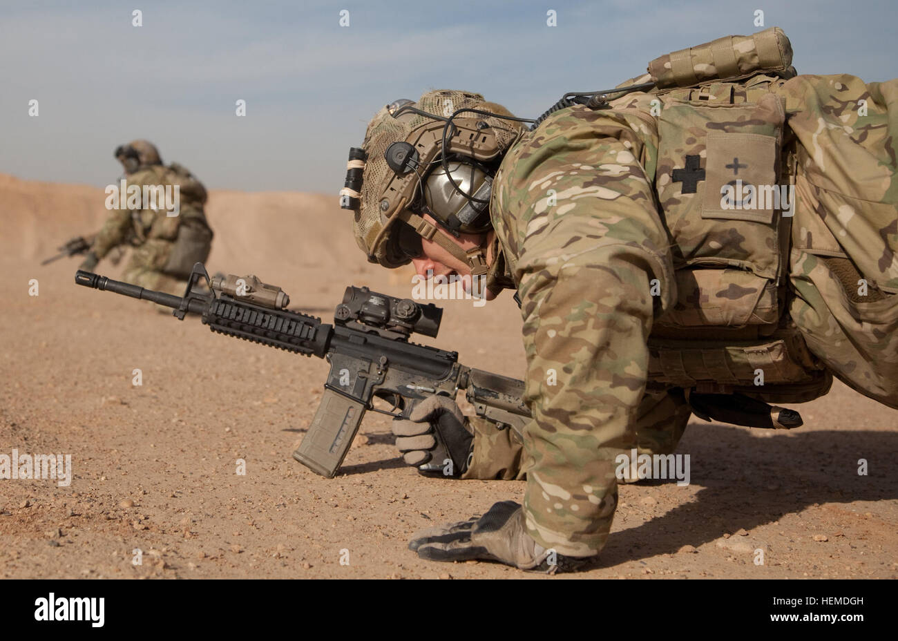 Coalition soldier participates in advance marksmanship training at a ...