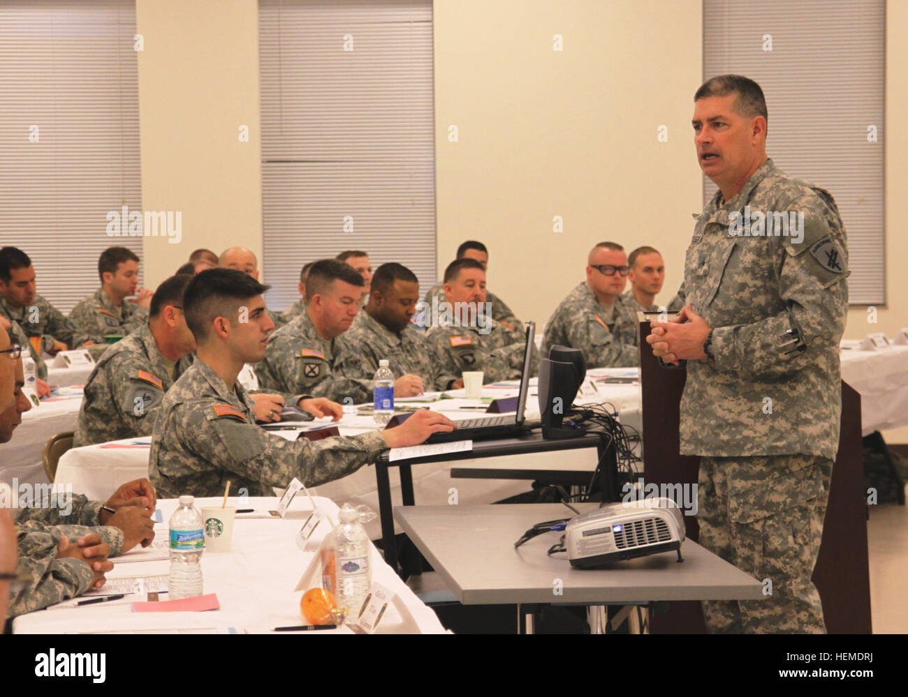 U.S. Army Brig. Gen. Mark McQueen, right, commanding general of the ...