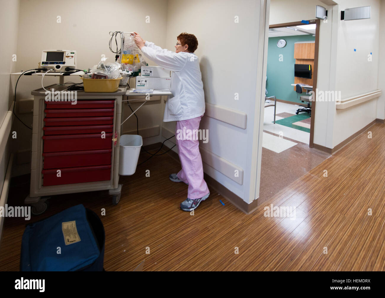 Deanna Simons, a licensed practical nurse, organizes medical supplies ...