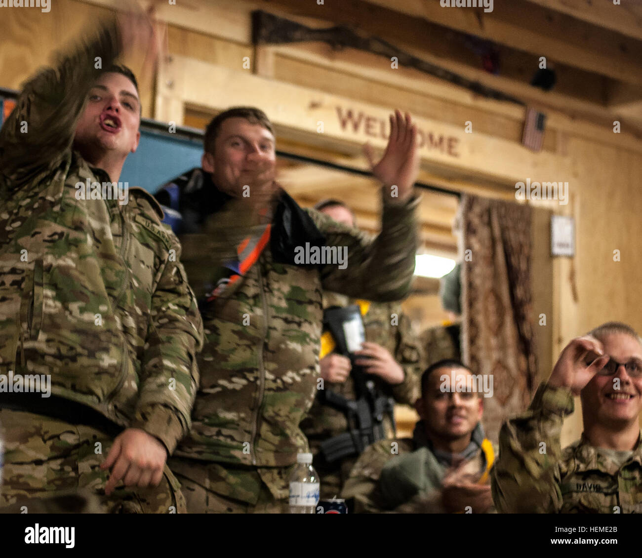 Soldiers from Task Force Falcon, 3rd Combat Aviation Brigade, react to ...