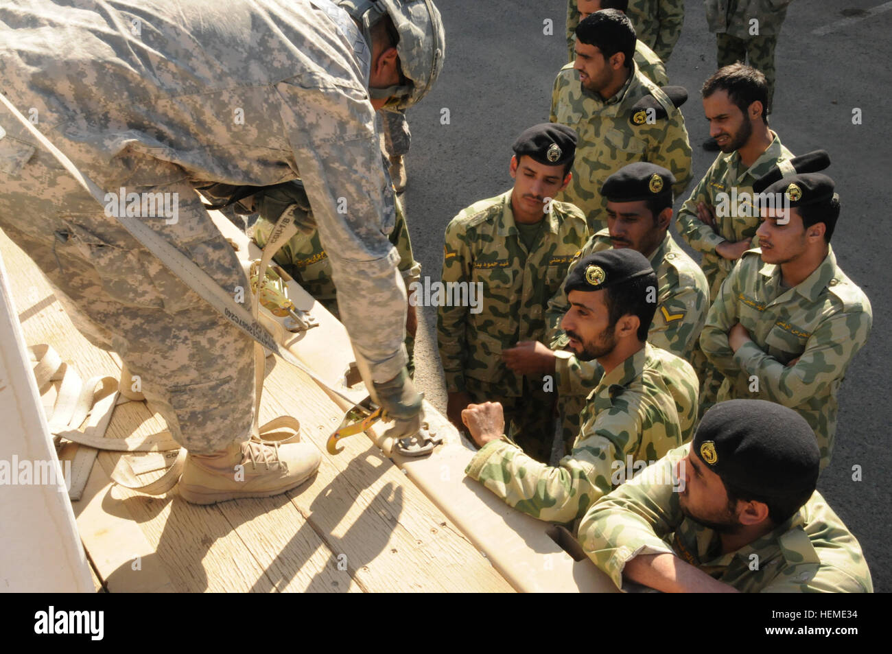 Kuwait National Guard transportation soldiers watch a demonstration by ...