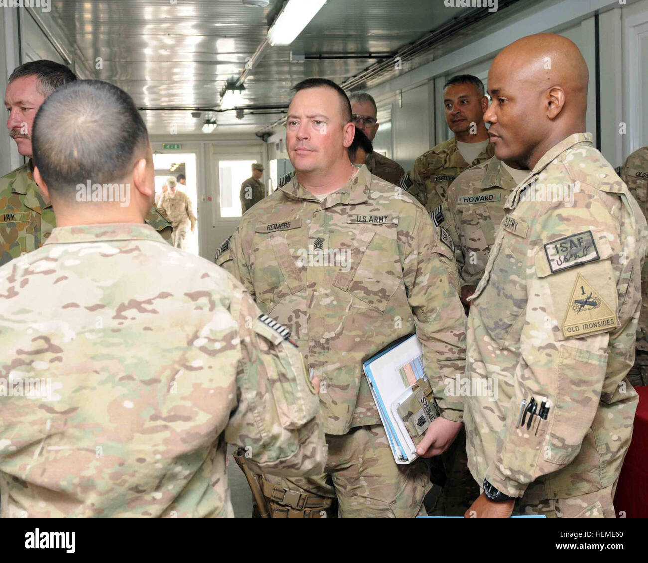 U.S. Army Command Sgt. Maj. Russell Reimers, center, the senior ...