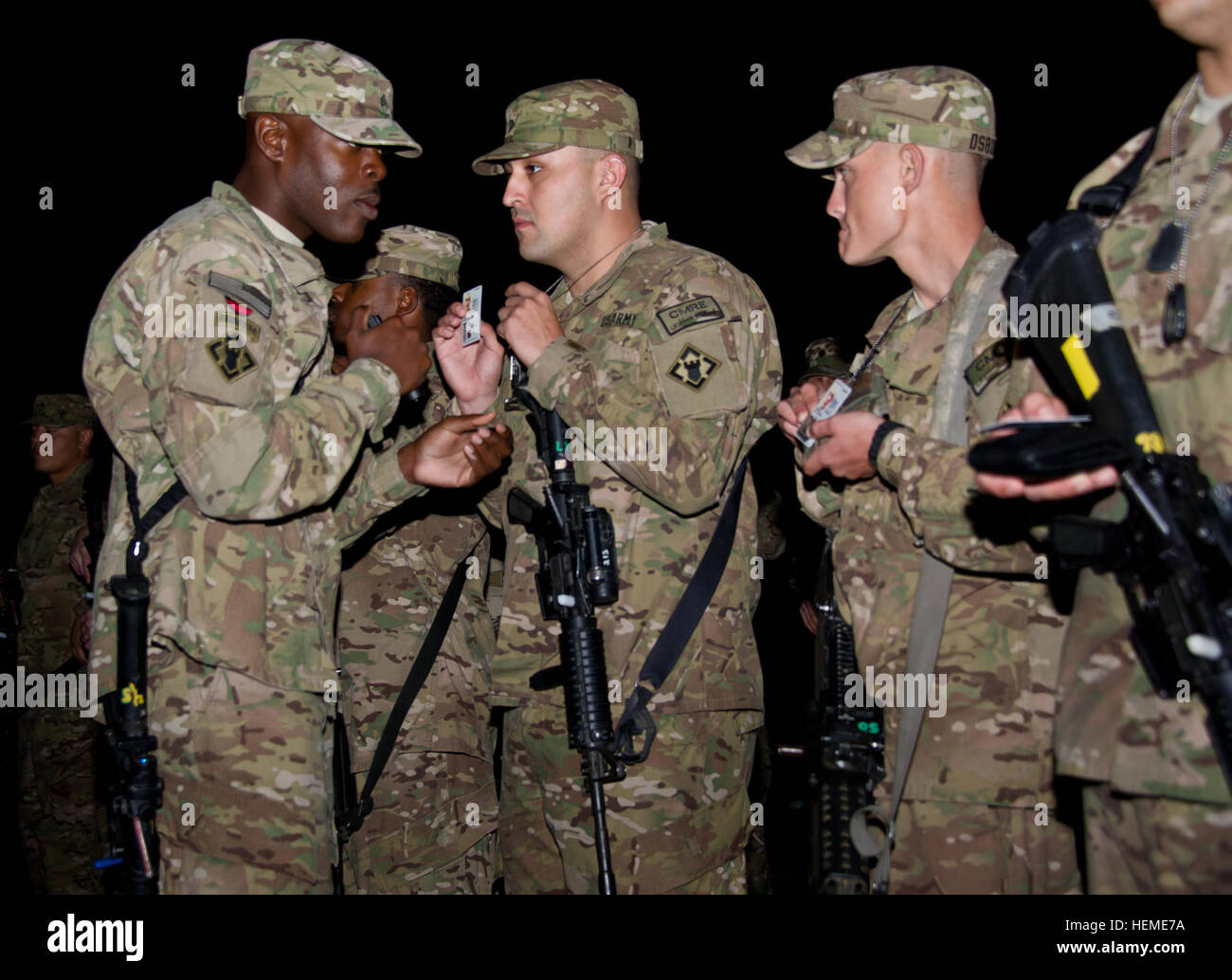 A sergeant in the 92nd Engineer Battalion "Black Diamonds," attached to ...