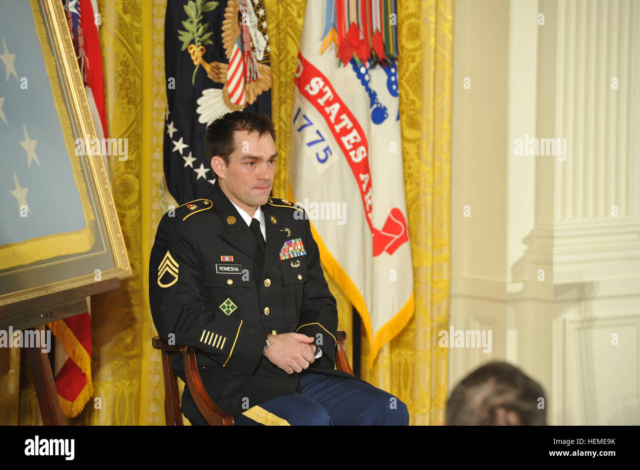 United States Army veteran Staff Sergeant Clinton Romesha sits while ...
