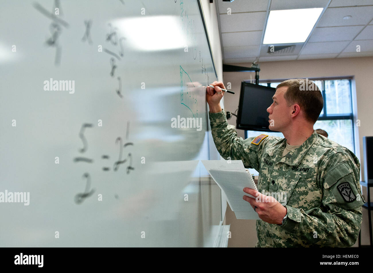 U.S. Army Spc. Dustin Salmon, a computer/detection systems repairer ...