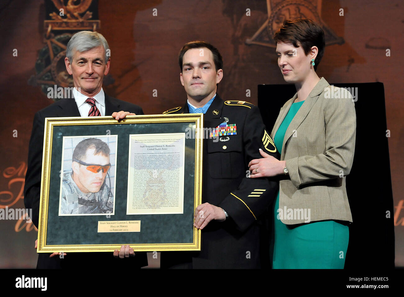Secretary of the Army John McHugh presents the Hall of Heroes induction ...