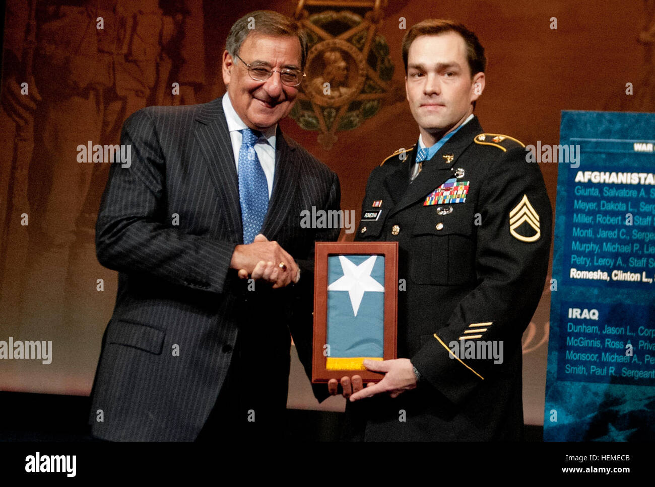 Secretary of Defense Leon Panetta presents the Medal of Honor Flag to ...