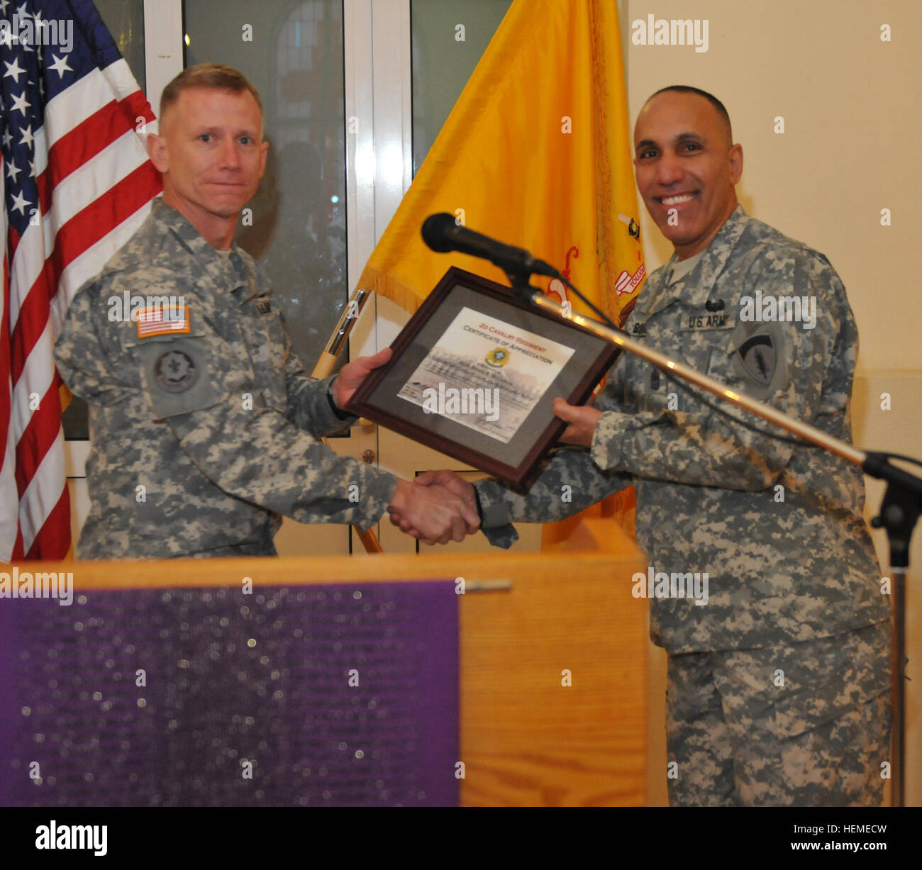 U.S. Army Col. Douglas A. Sims, left, the commander of the 2nd Cavalry ...