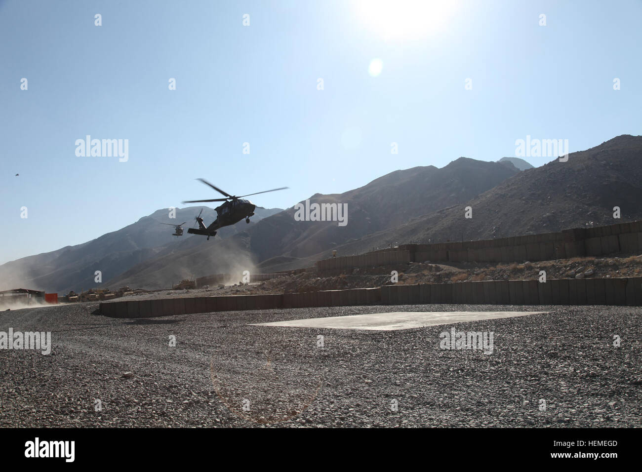 A UH-60 Black Hawk helicopter lands on Forward Operating Base Tagab ...