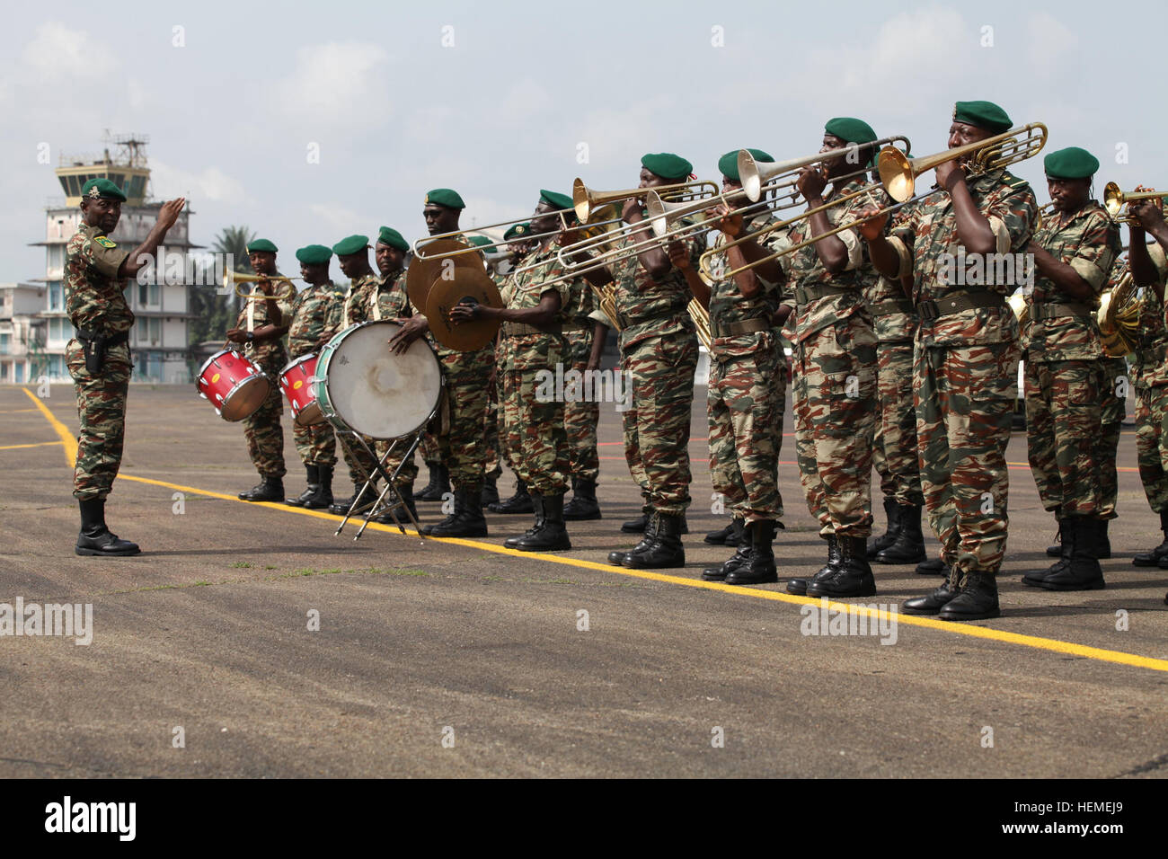 A Band Conductor leads the Army Band from the Cameroonian Defense Force ...