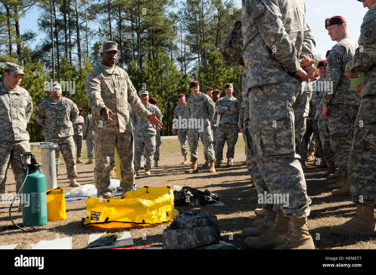A U.S. Soldier assigned to the 20th Support Command, center, briefs ...