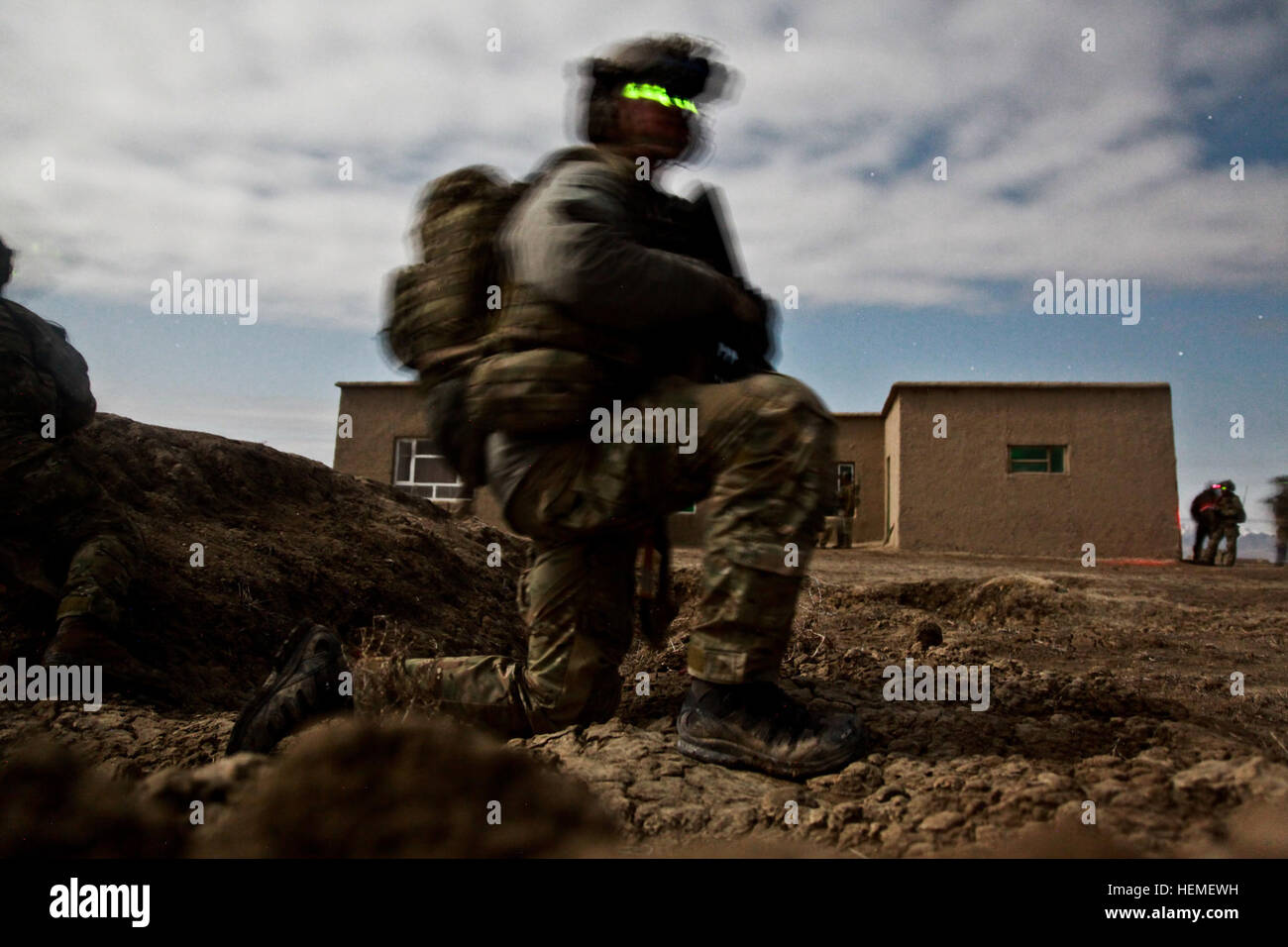 Coalition security forces conduct a night operation in Andar district ...
