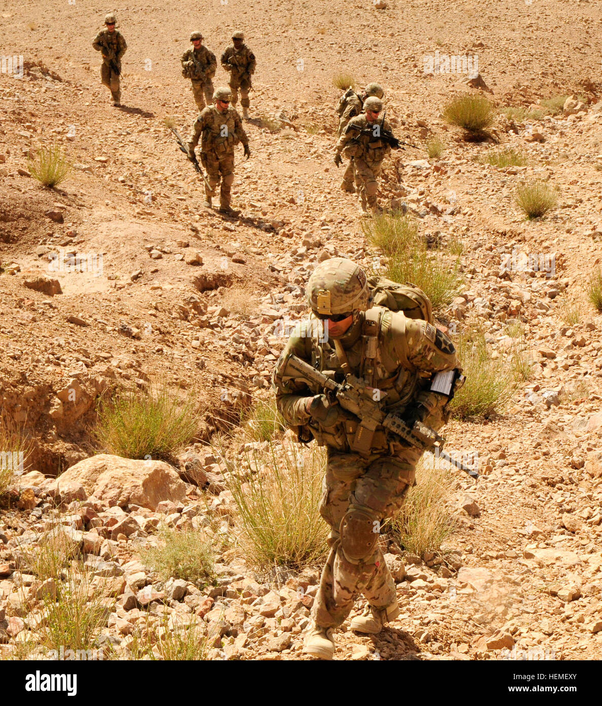 U.S. Soldiers with the 2nd Battalion, 23rd Infantry Regiment, climb a ...