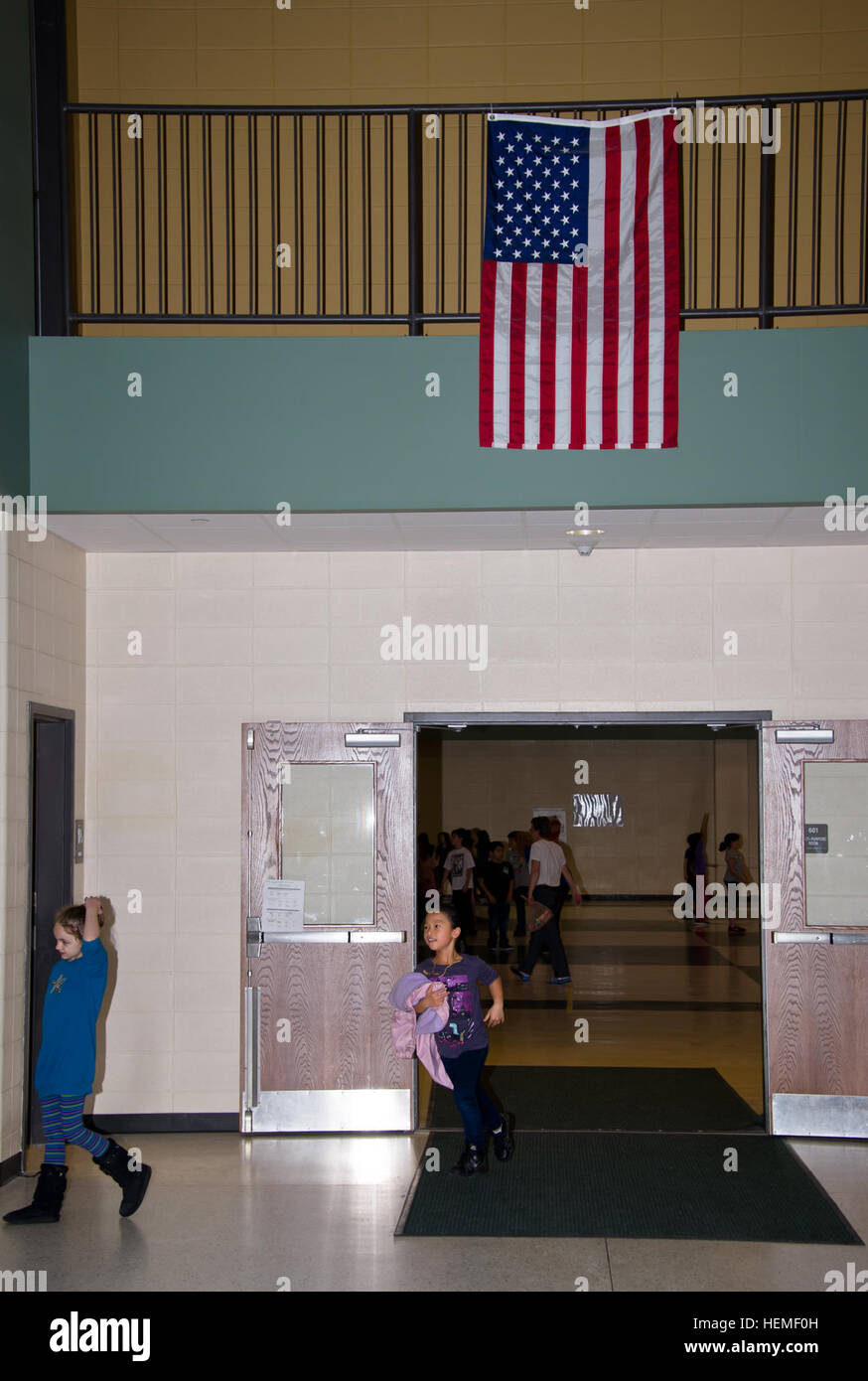 A student of Richmond Hill Elementary School races to catch up to her ...