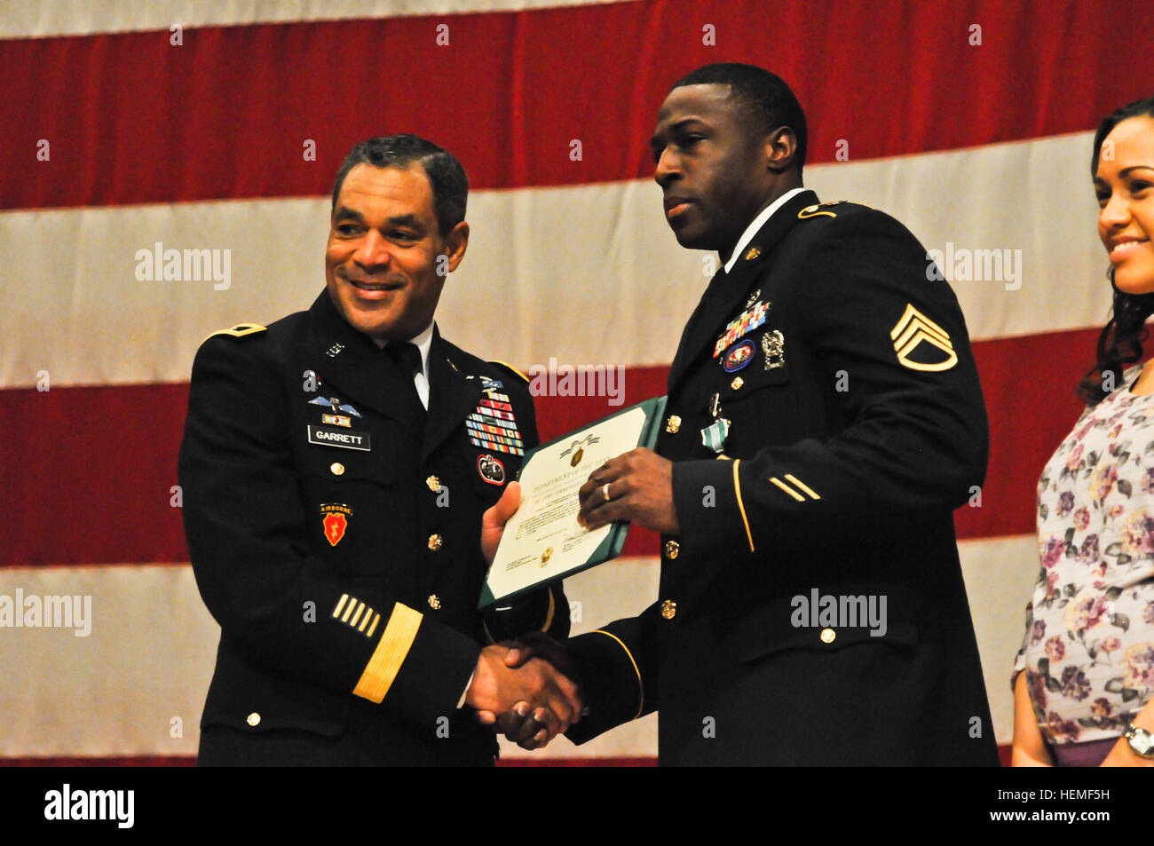 U.S. Army Maj. Gen. Michael X. Garrett, left, the commanding general of ...