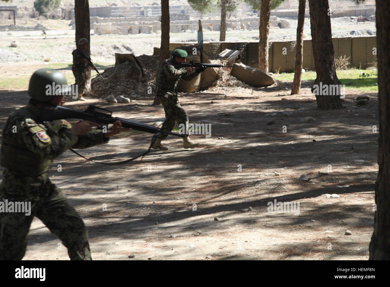 Afghan National Army soldiers serving with 201st corps, move tactically ...