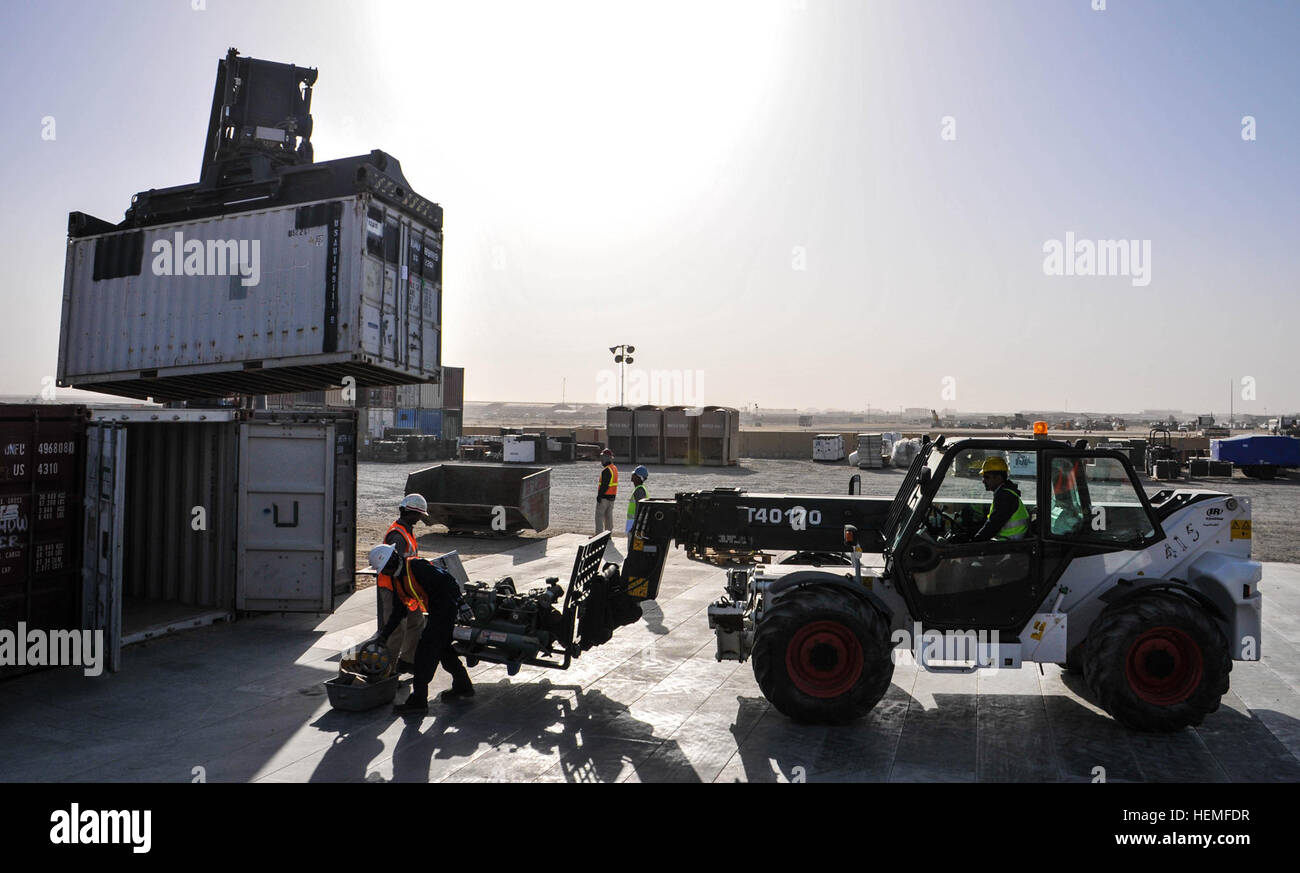 CAMP ARIFJAN, Kuwait— Contractors for the retrograde yard at the ...